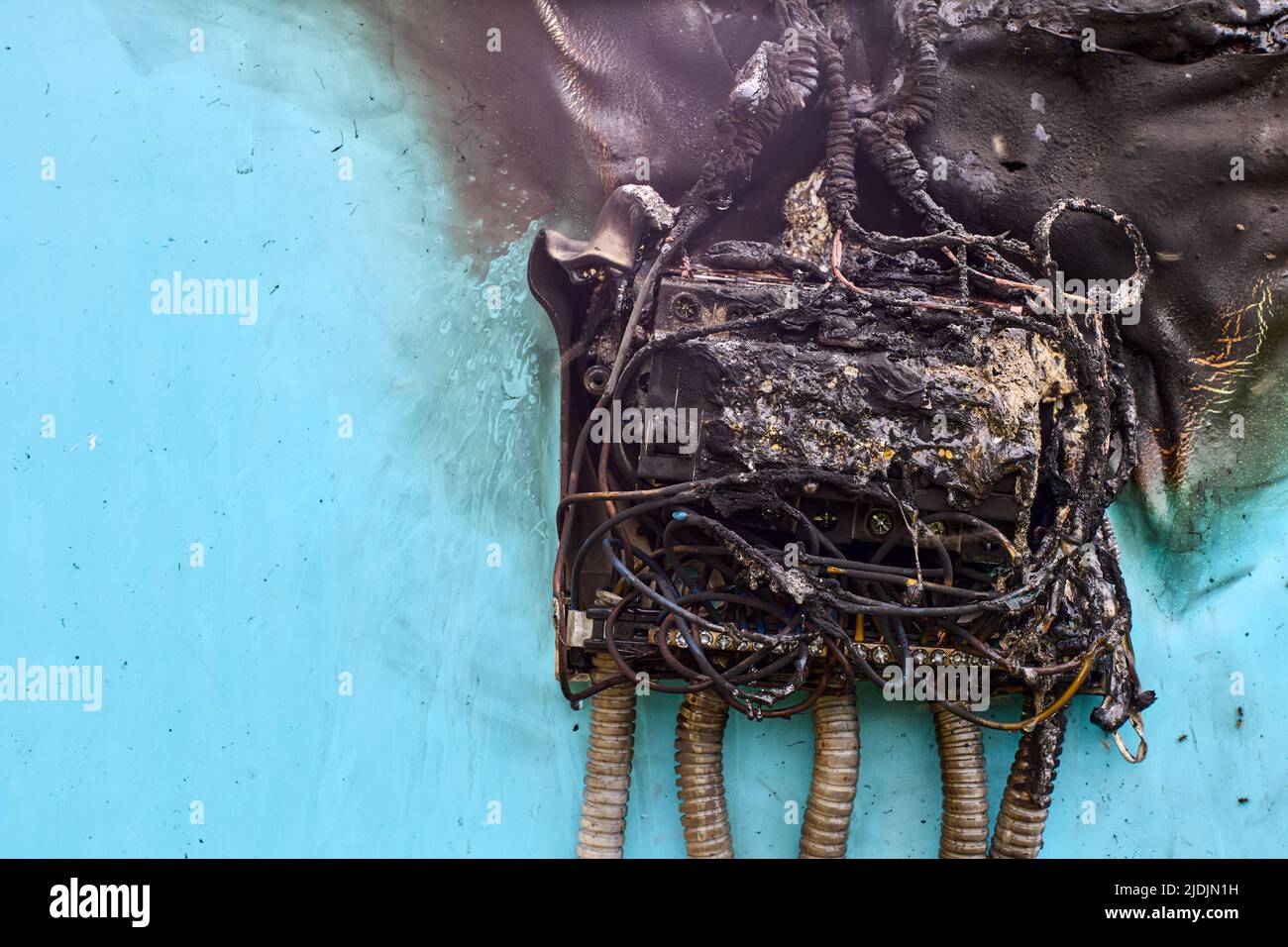 Electrical fire after short circuit in consumer unit, burnt wiring and ...