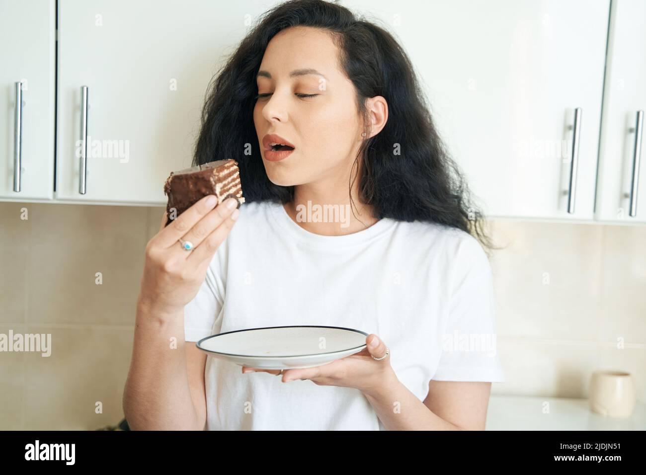 Young lady mouth open eat hi-res stock photography and images - Alamy