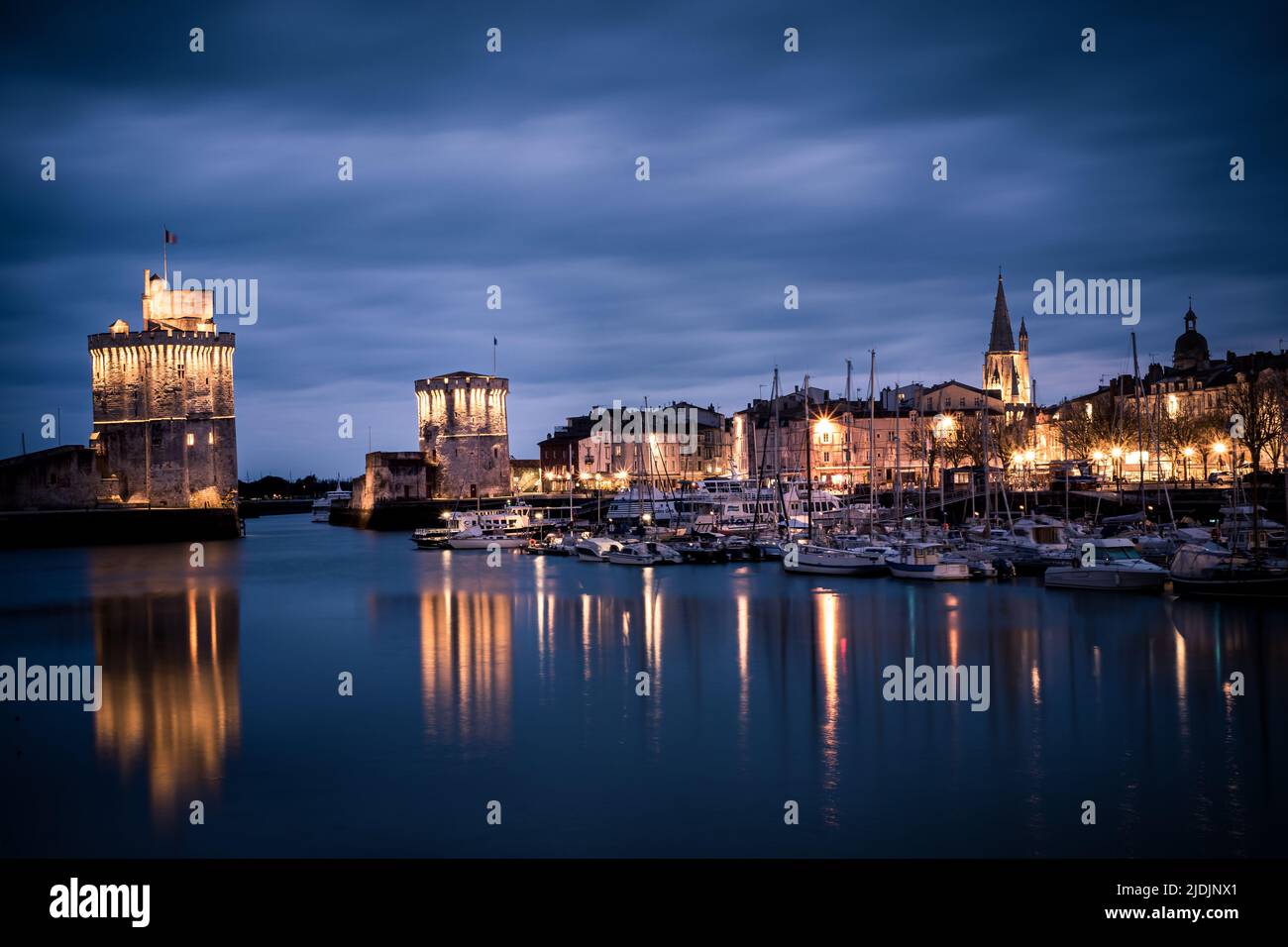 Panoramic view of the old harbor of La Rochelle at blue hour with its ...