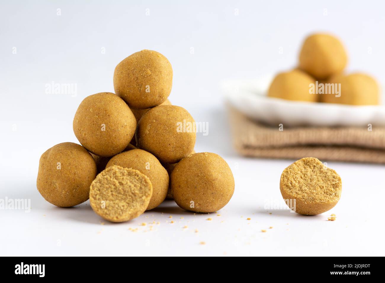 Stack of Dankwa, (maize-peanut balls) snack Hausa delicacy isolated ...
