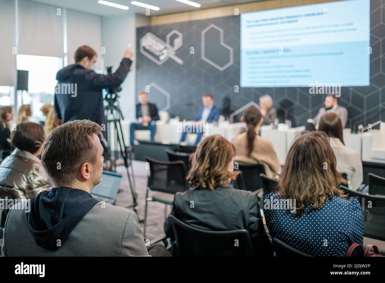 Back view of group of anonymous male and female businesspeople in ...