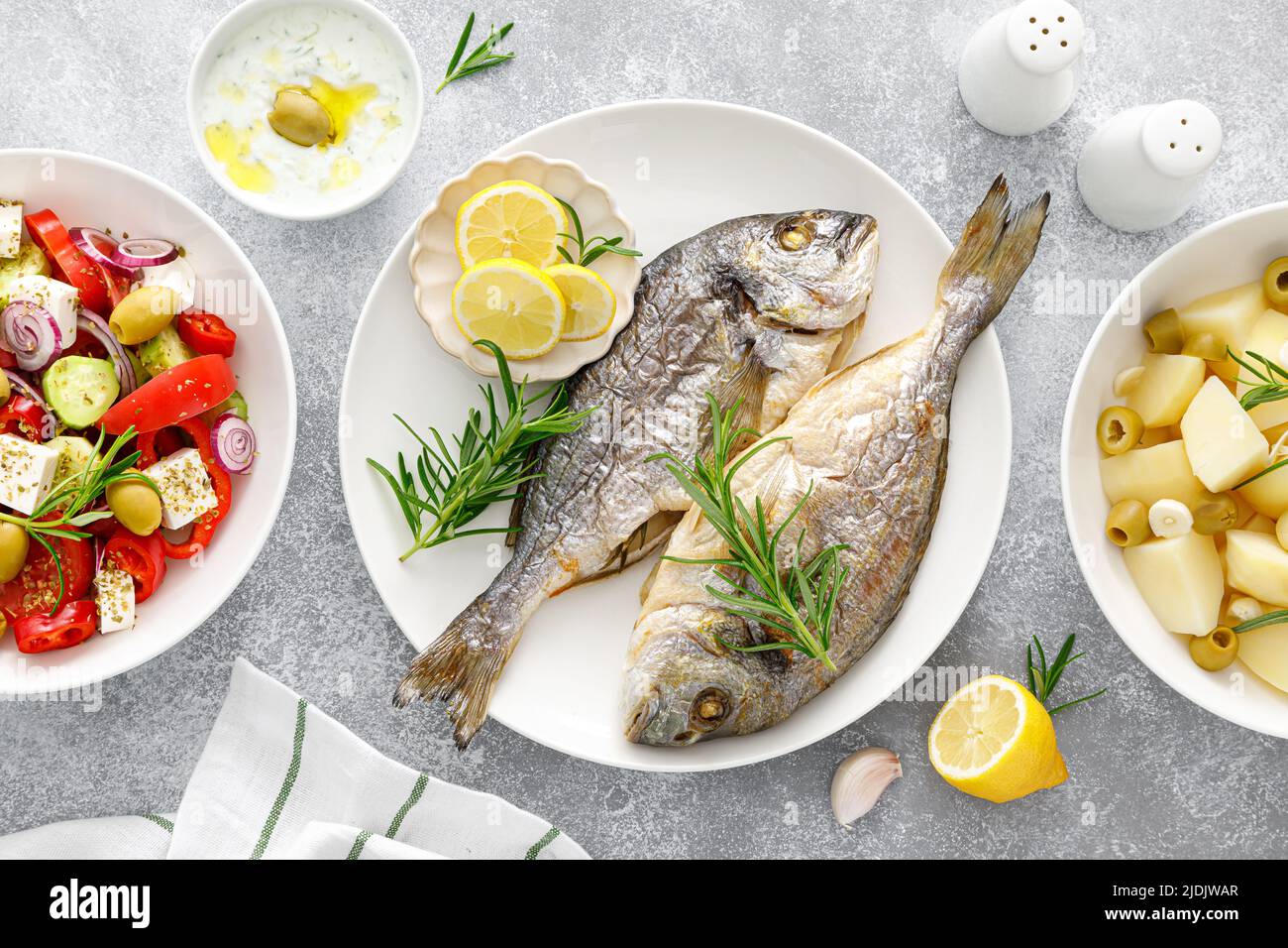 Dorada fish sea bream baked, fresh vegetable greek salad, boiled ...