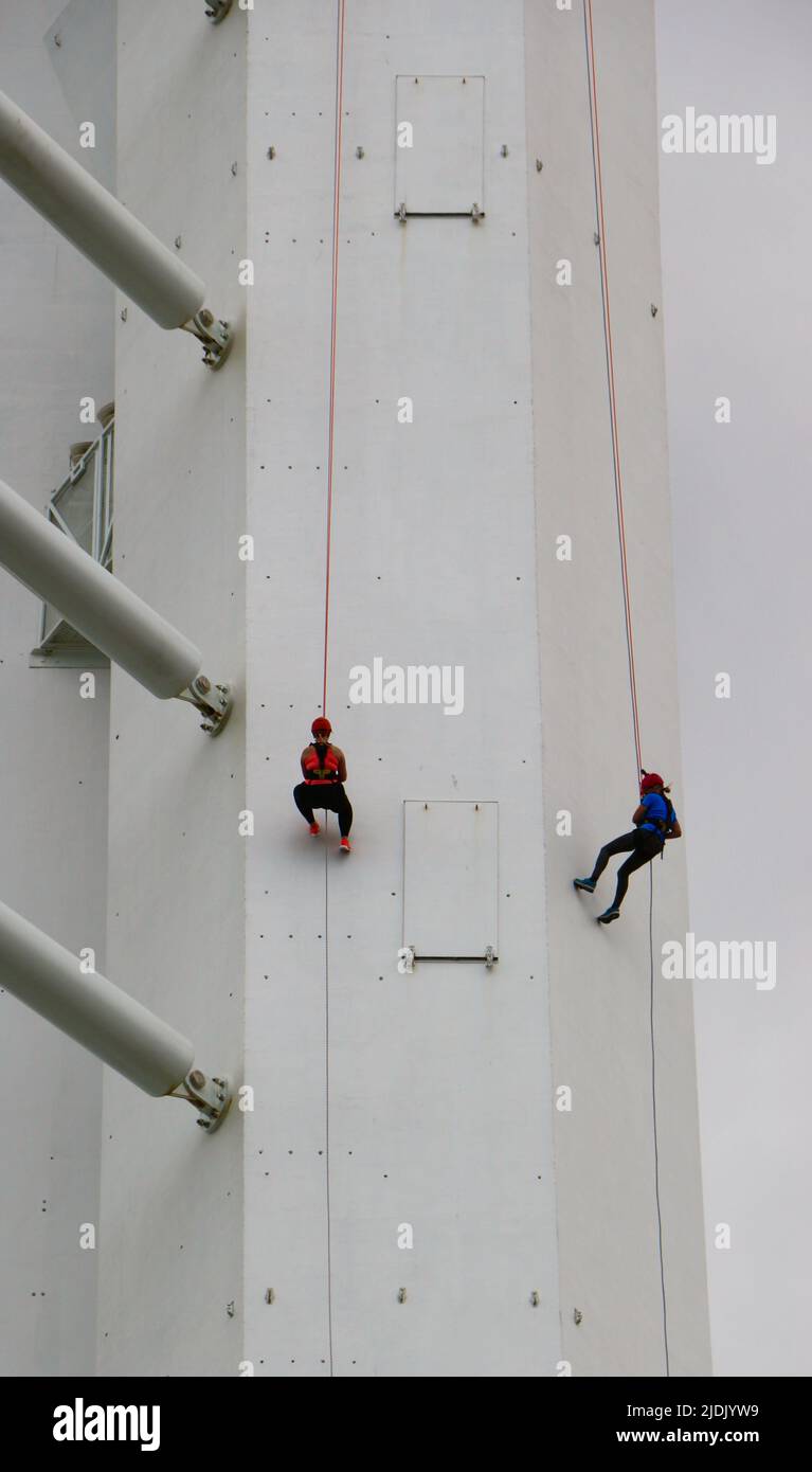 Two women abseiling down the Spinnaker Tower Portsmouth England UK ...