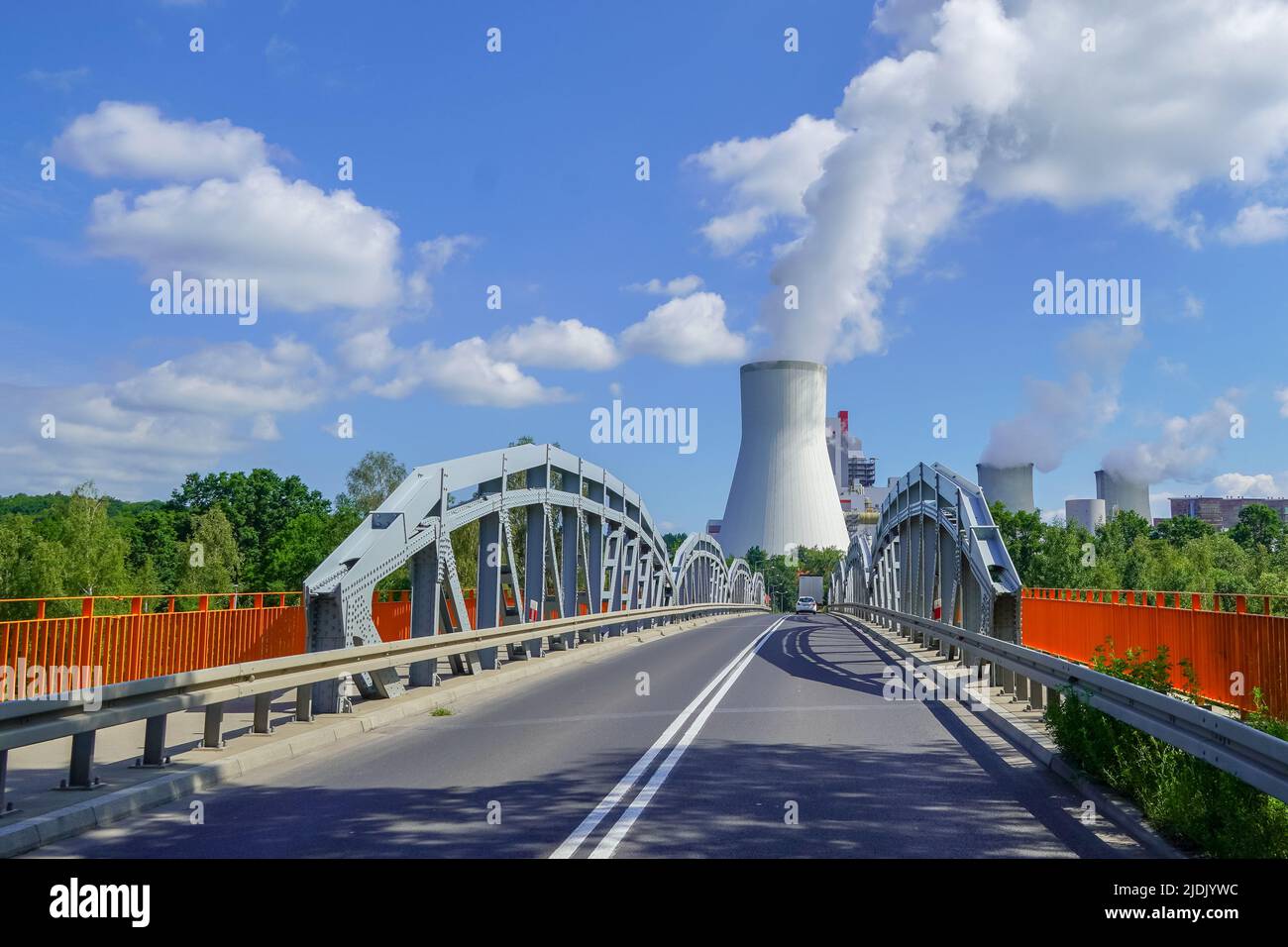 bridge to green transition, modern coal power plant and bridge leading ...