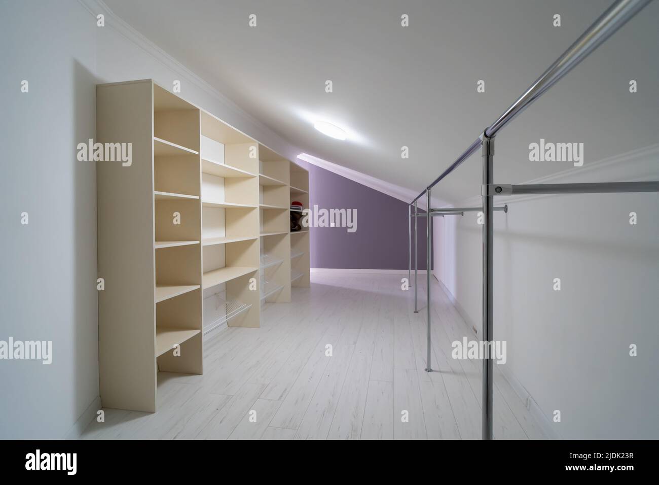 Large empty white room closet for clothes and things in attic of ...