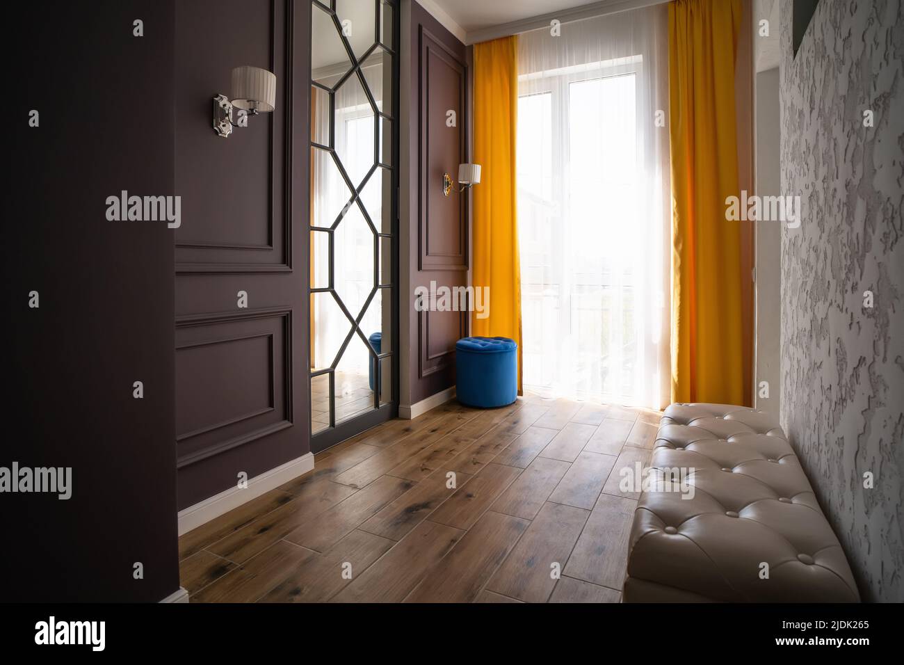 Modern entrance hall or hallway in residential building with large ...
