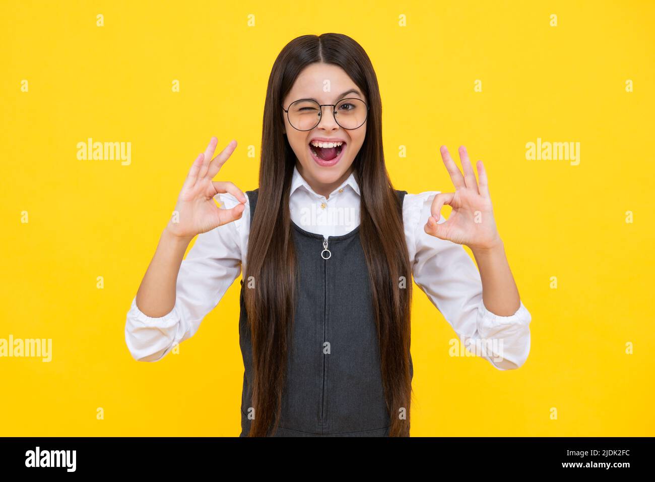 Okay. Young girl child show fingers ok symbol sign language isolated on ...
