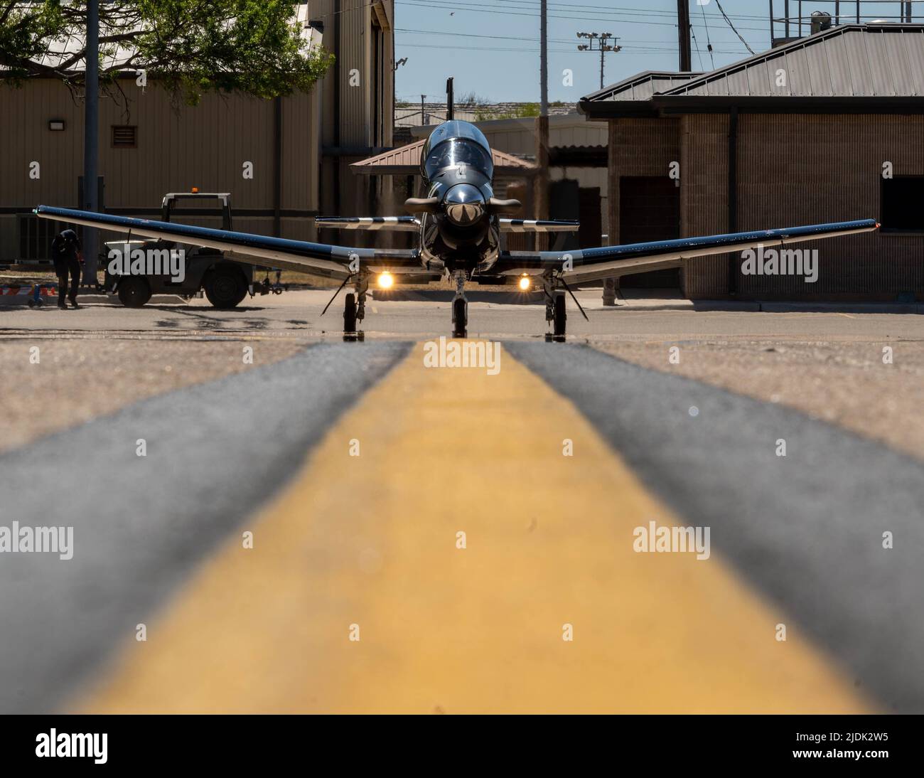 A T-6 Texan II taxis to the runway at Laughlin Air Force Base, Texas ...