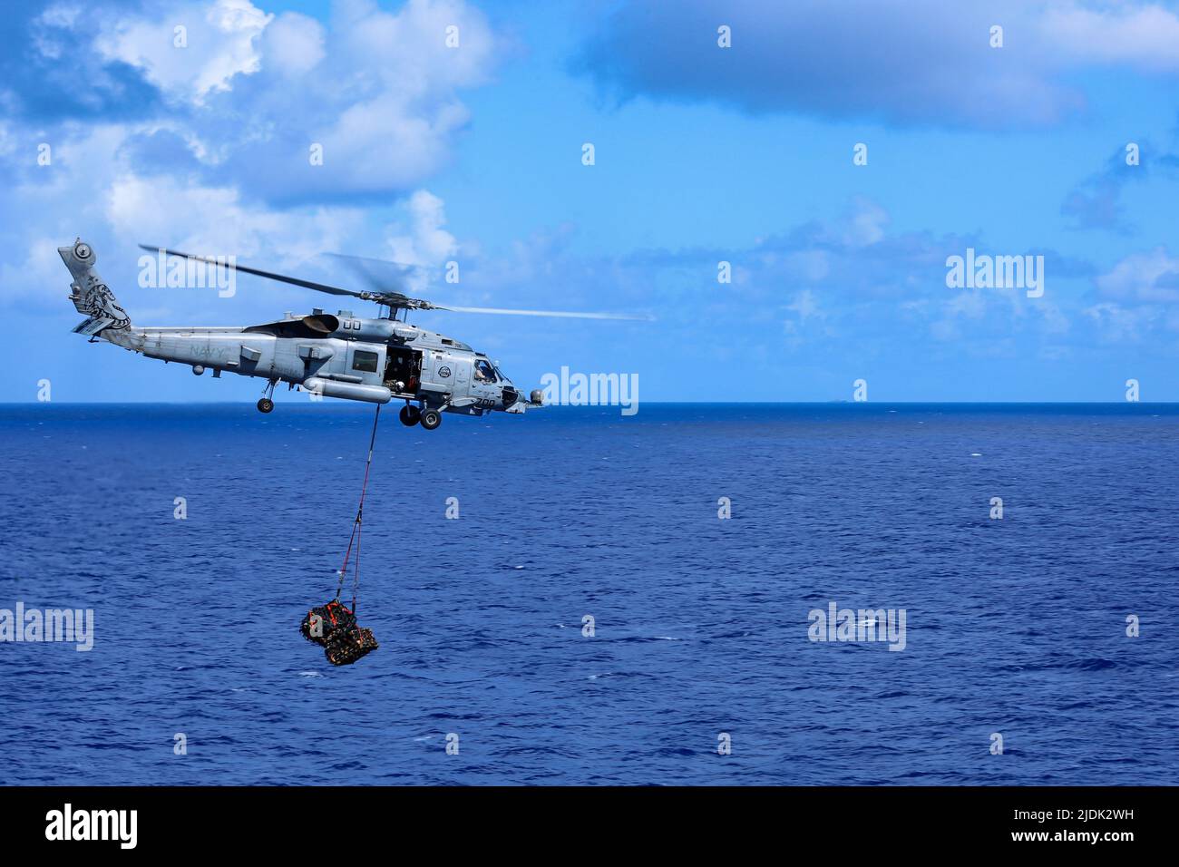 PHILIPPINE SEA (June 19, 2022) An MH-60R Seahawk, assigned to the ...