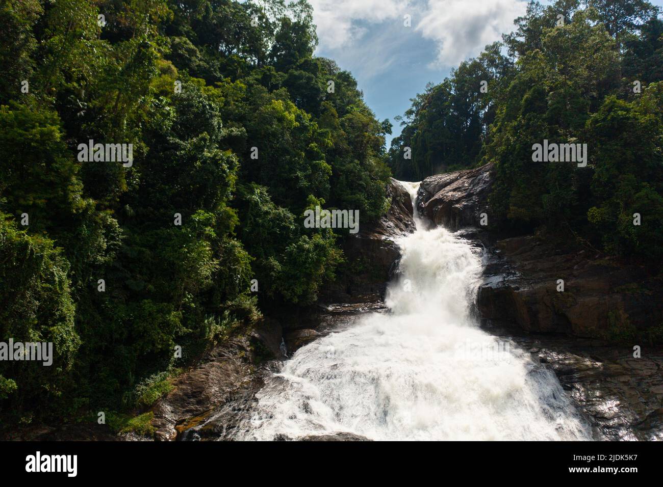 Aerial drone of Waterfall in the tropical mountain jungle. Bopath Falls ...