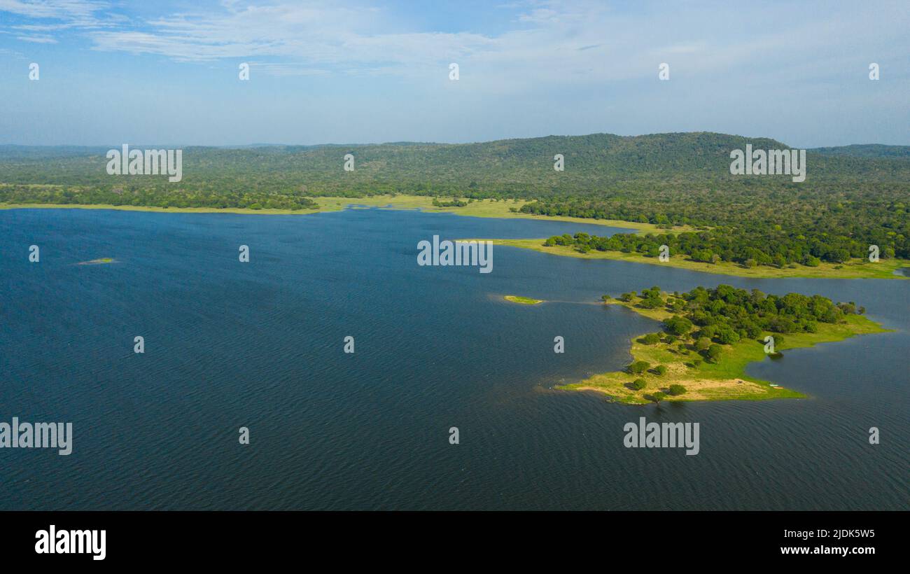Lake in the background of mountains with tropical forest and jungle ...