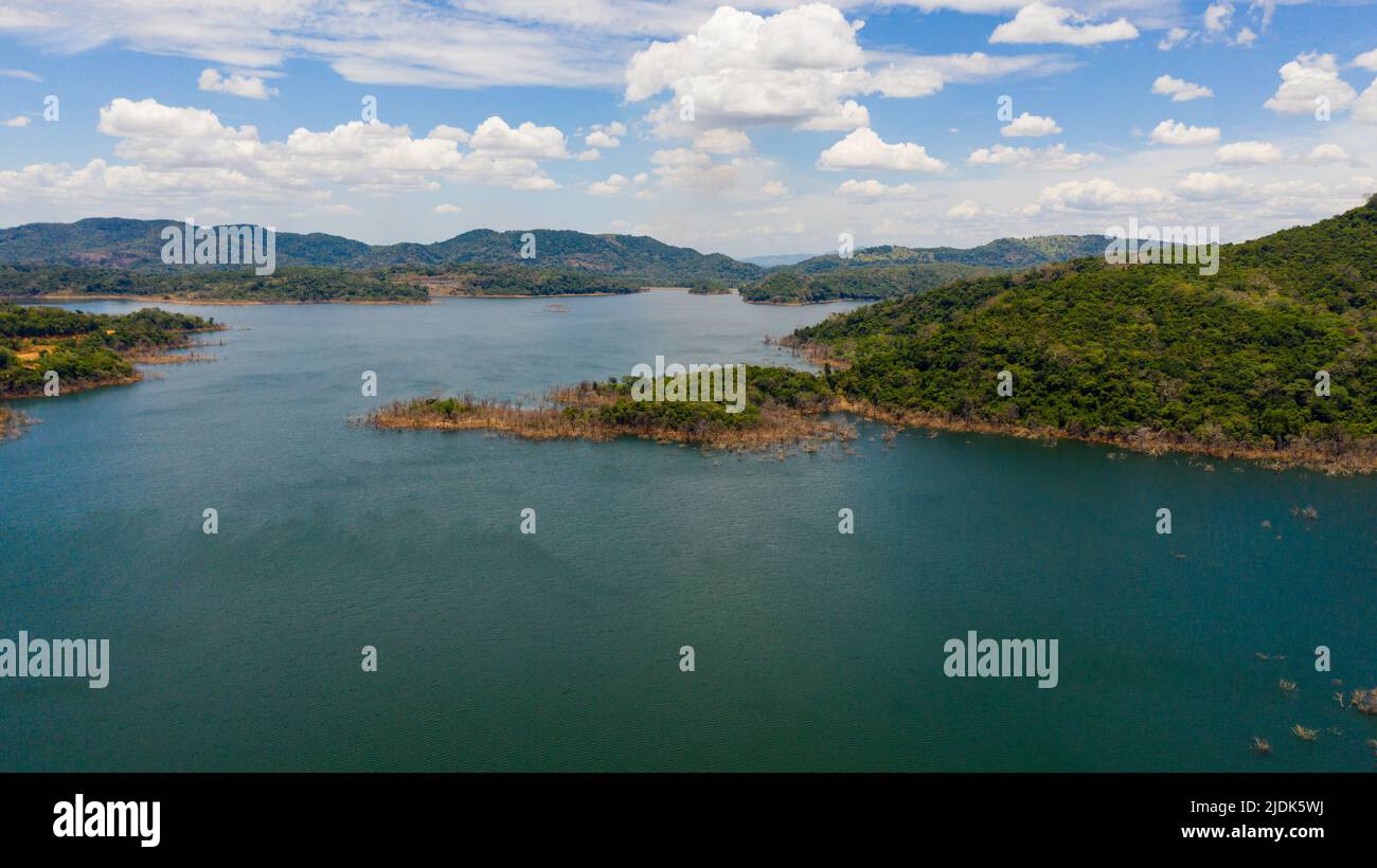 Lake among the mountains covered with jungle. Kalu Ganga Reservoir, Sri ...