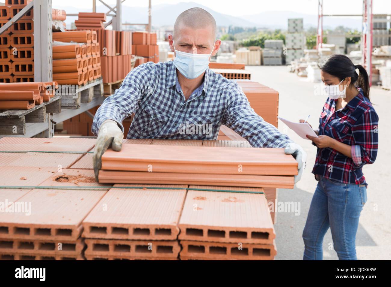 Builder mask bricks hi-res stock photography and images - Alamy