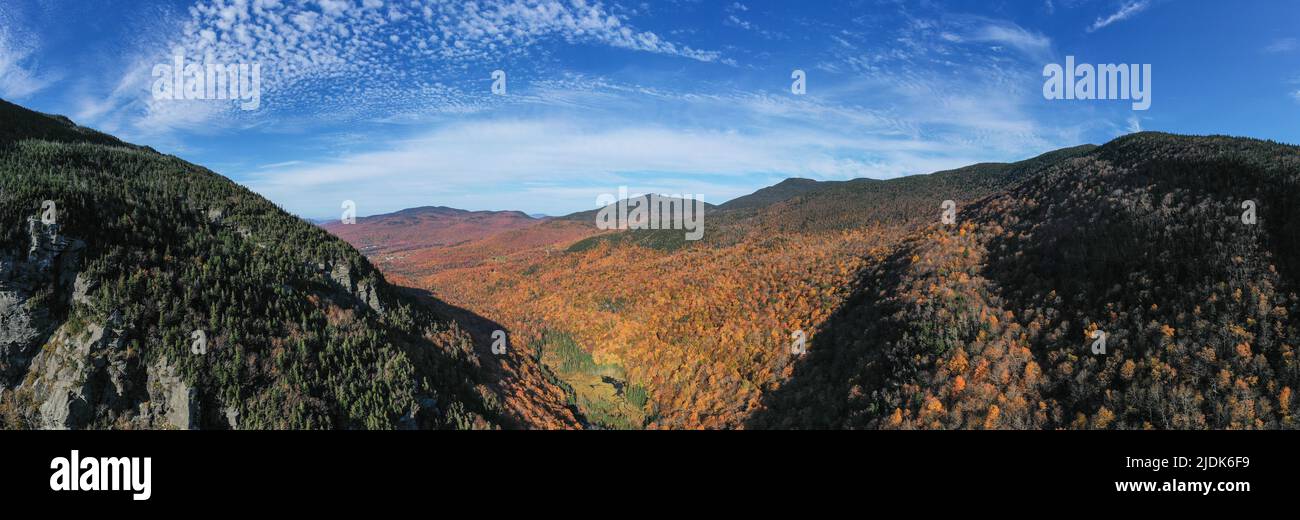 Panoramic view of peak fall foliage in Smugglers Notch, Vermont Stock ...
