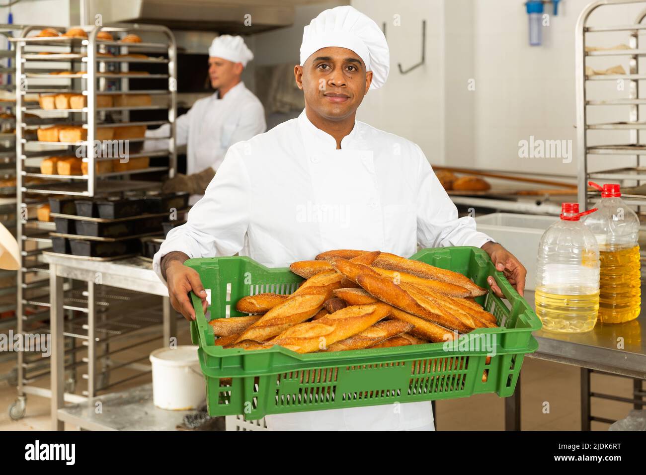 Portrait of successful baker during daily work Stock Photo - Alamy
