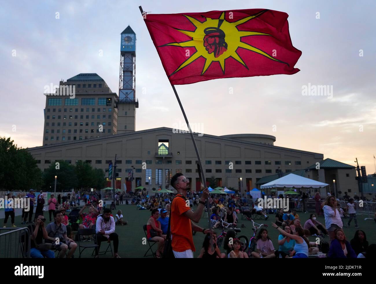 Ont., Canada, June 21, 2022. A man waves a Six Nations flag as people ...