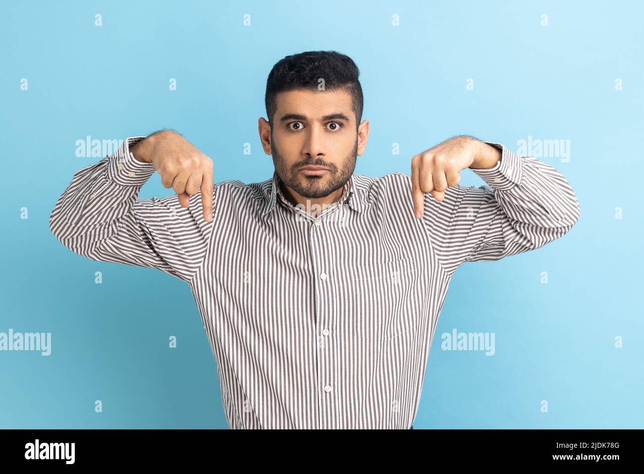 Looking down facial expression hi-res stock photography and images - Alamy