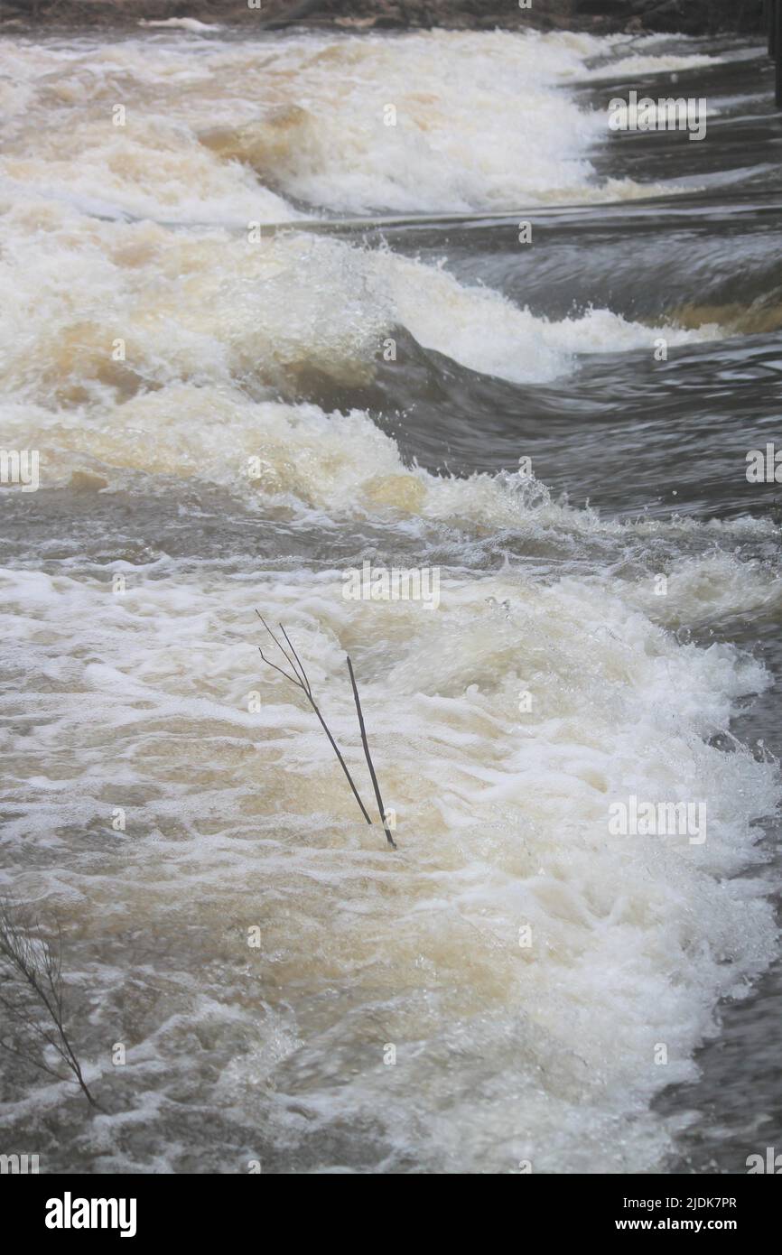 Fast flowing water after floods Stock Photo - Alamy