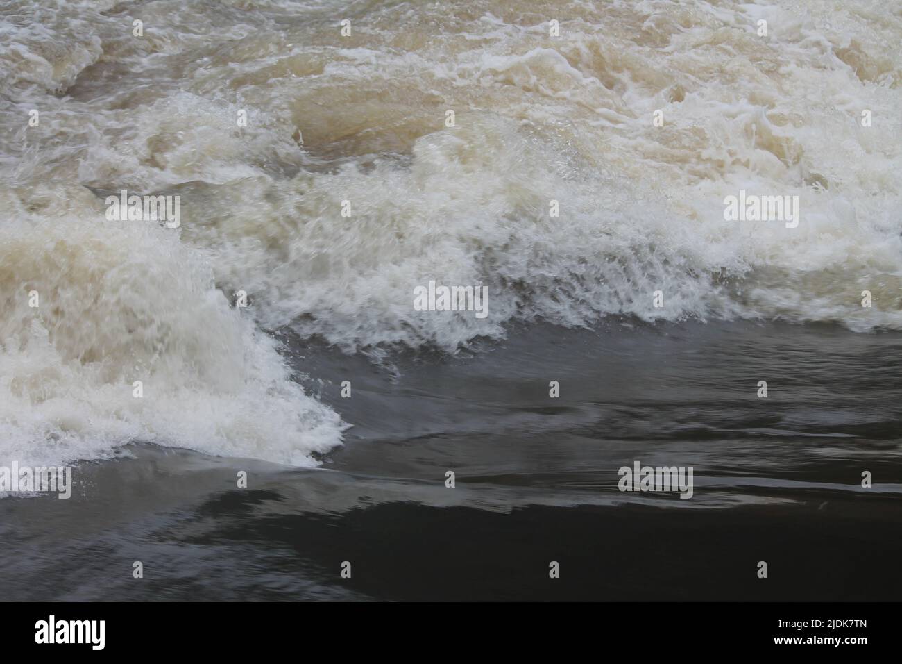 Fast flowing water after floods Stock Photo - Alamy