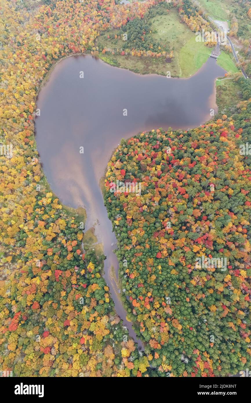 Colgate Lake in Upstate New York during peak fall foliage season Stock ...