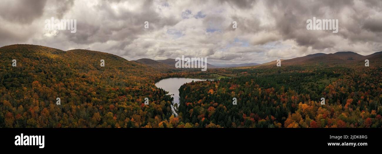 Colgate Lake in Upstate New York during peak fall foliage season Stock ...