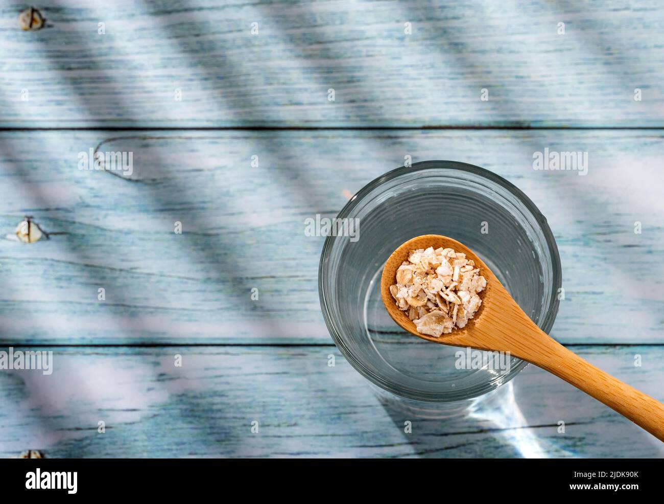 Oat flakes to mix in filtered water - Avena sativa Stock Photo - Alamy