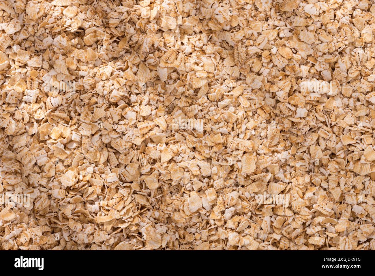 Oat flakes background - Avena sativa Stock Photo - Alamy