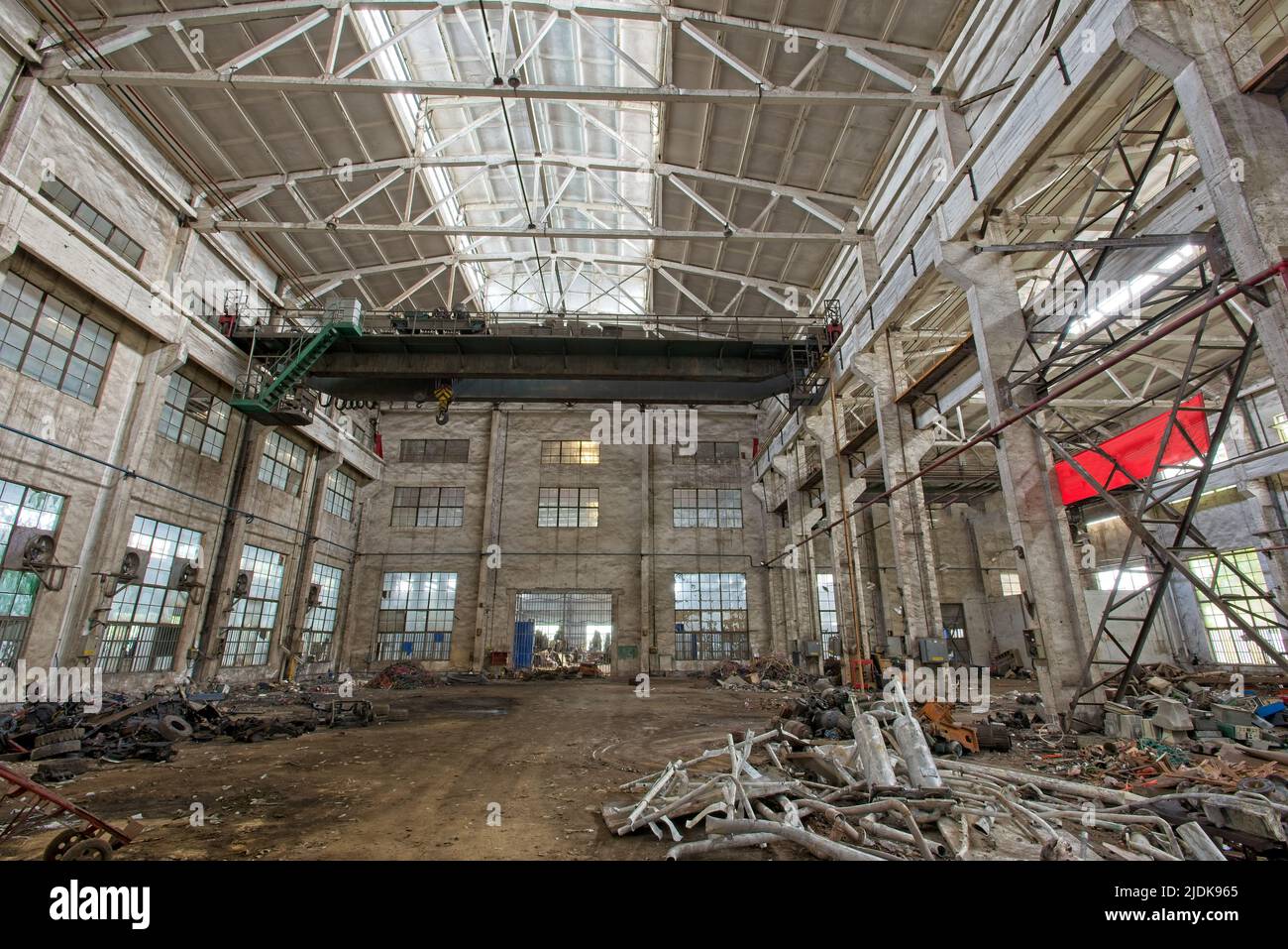 Interior of abandoned steel frame workshop factory building in ...