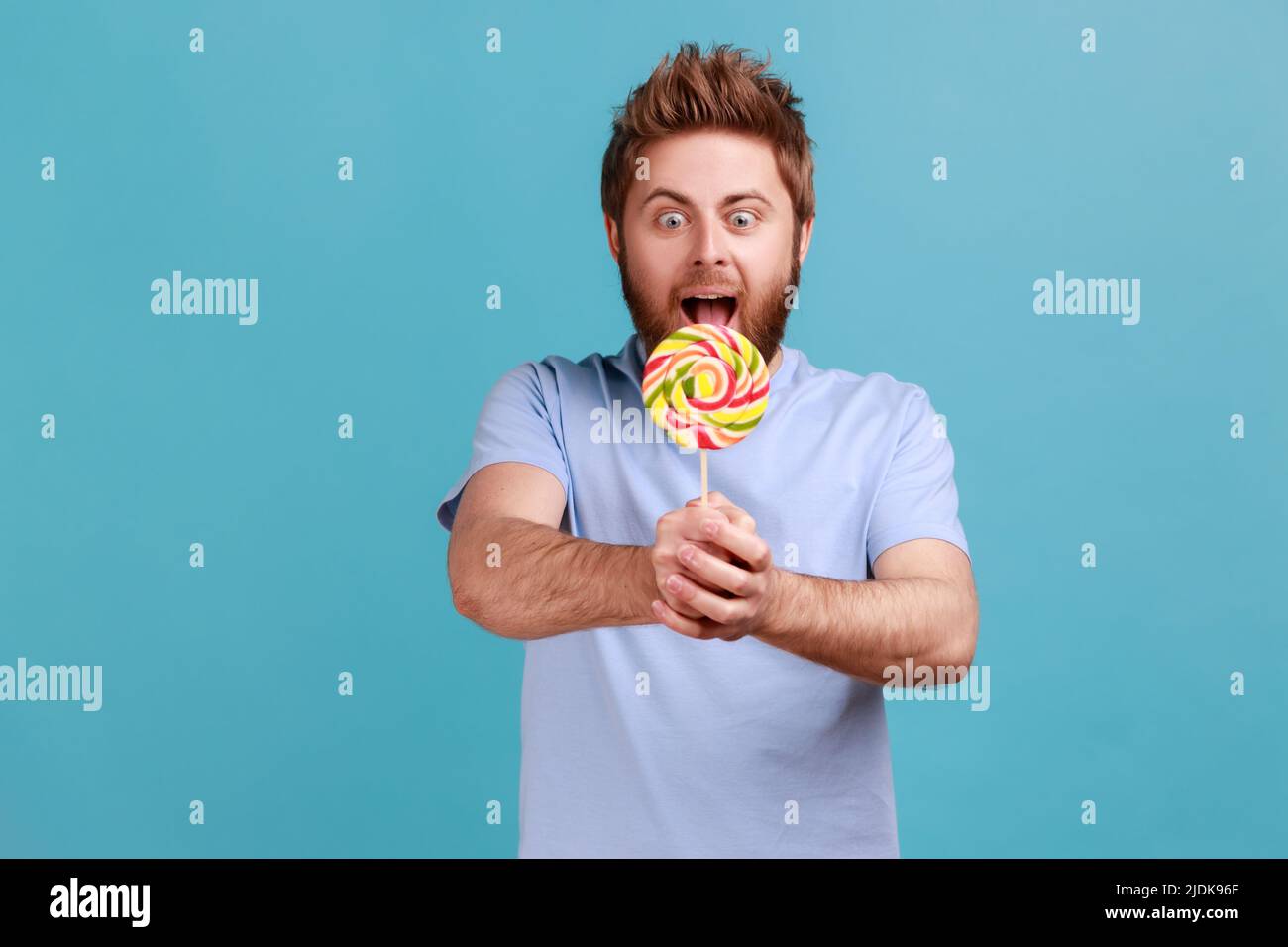 Excited handsome hungry guy hi-res stock photography and images - Alamy