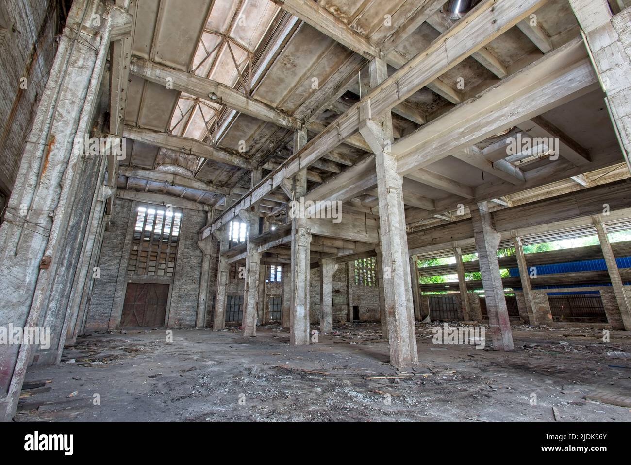 Interior of abandoned steel frame workshop factory building in ...