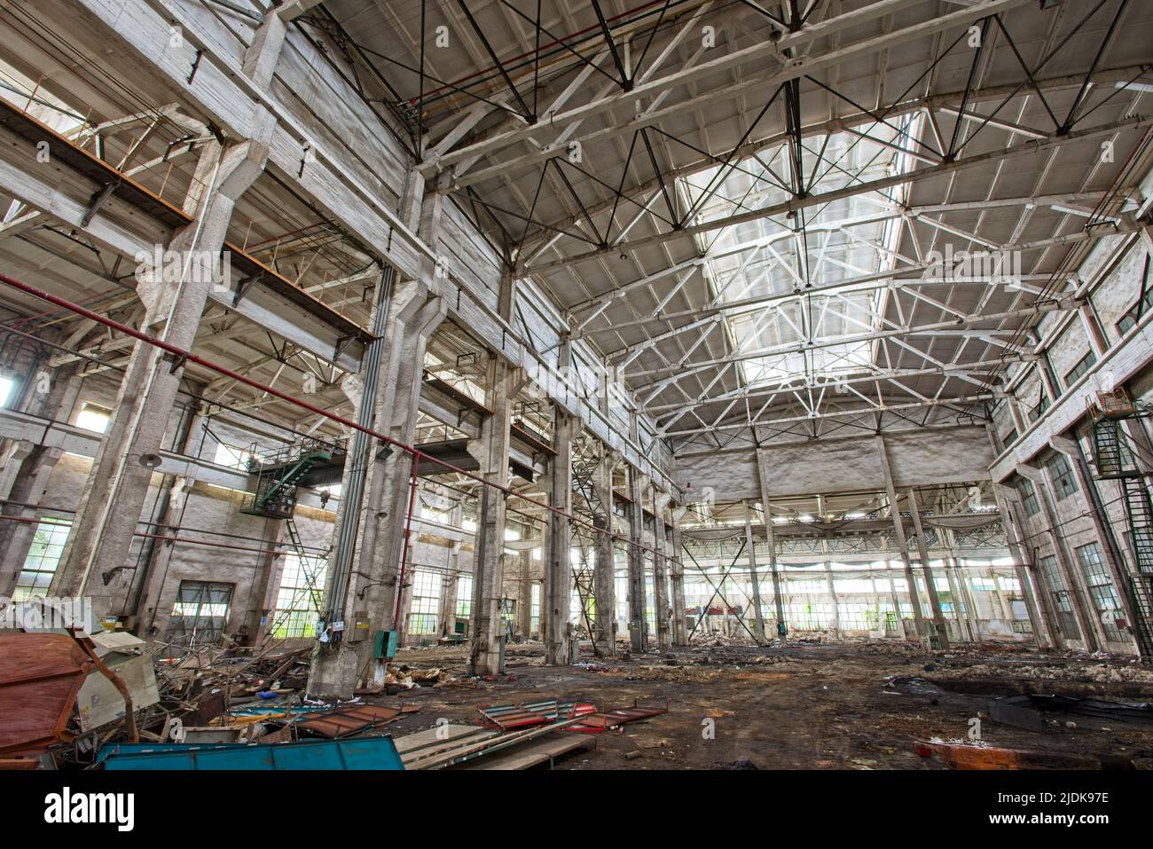 Interior of abandoned steel frame workshop factory building in ...