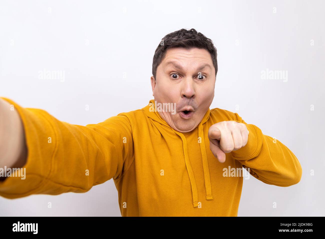 Portrait Of Shocked Man Blogger Pointing At You Looking At Camera With Open Mouth Pov Point