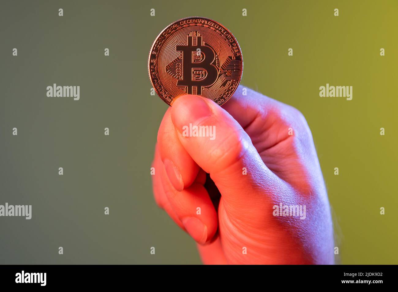 Bitcoin btc coin man holding hi-res stock photography and images - Alamy