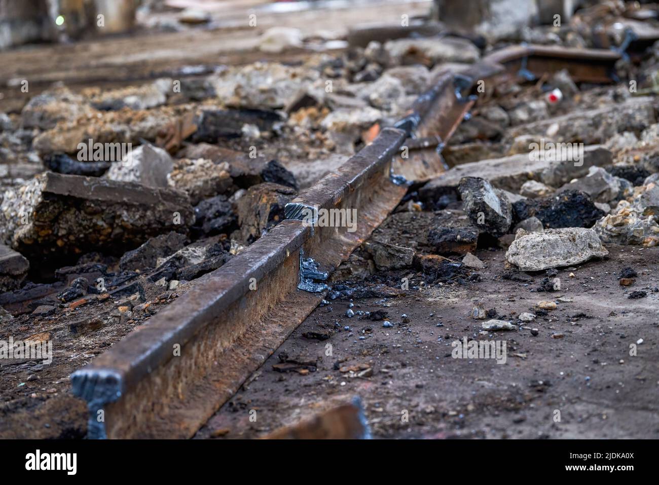 Close-up of industrial waste garbage in an abandoned factory workshop ...