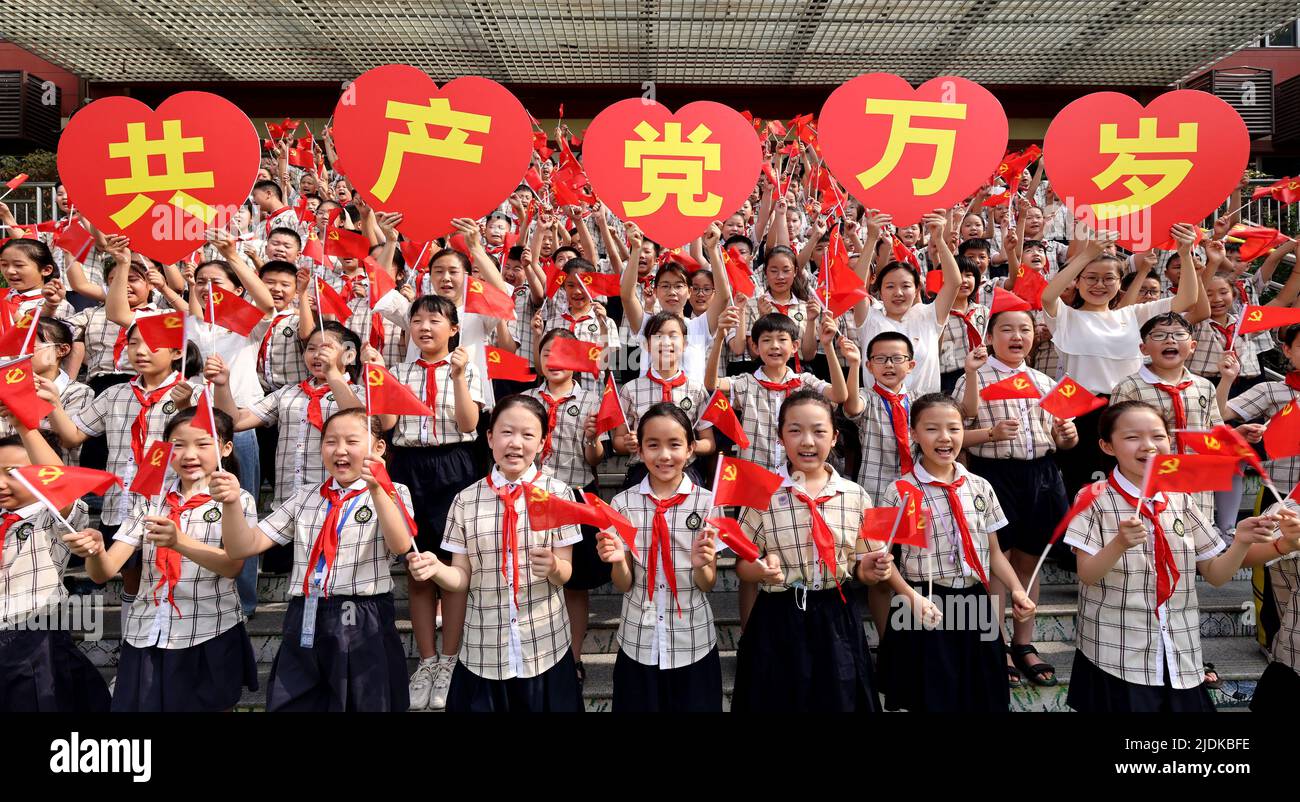 ZAOZHUANG, CHINA - JUNE 22, 2022 - Teachers and students sing together ...