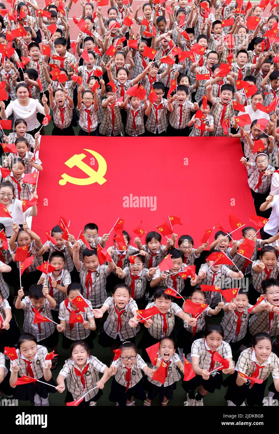 ZAOZHUANG, CHINA - JUNE 22, 2022 - Teachers and students sing together ...