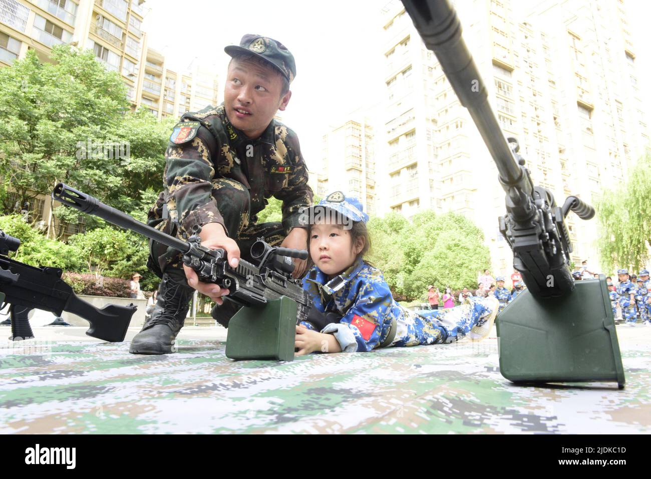 HEFEI, CHINA - JUNE 21, 2022 - Children take part in a target shooting ...