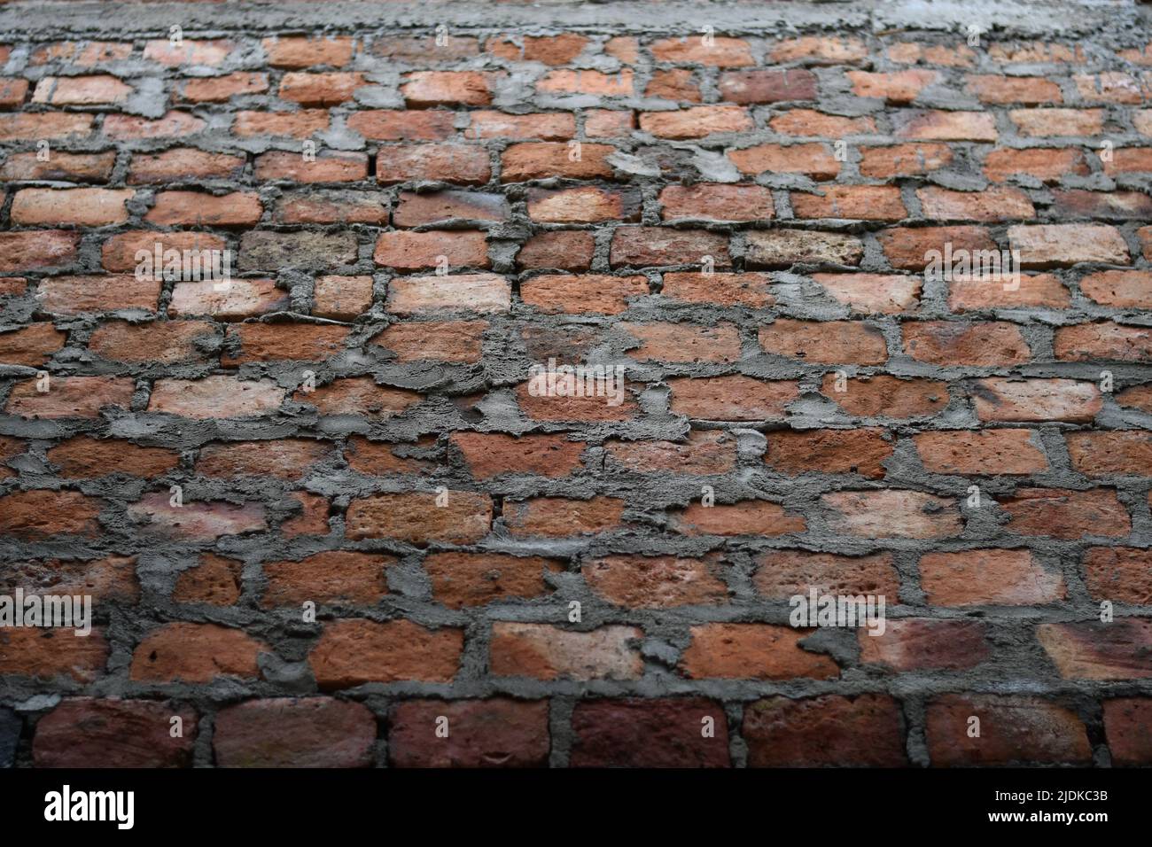 Wall was built by using bricks Stock Photo - Alamy