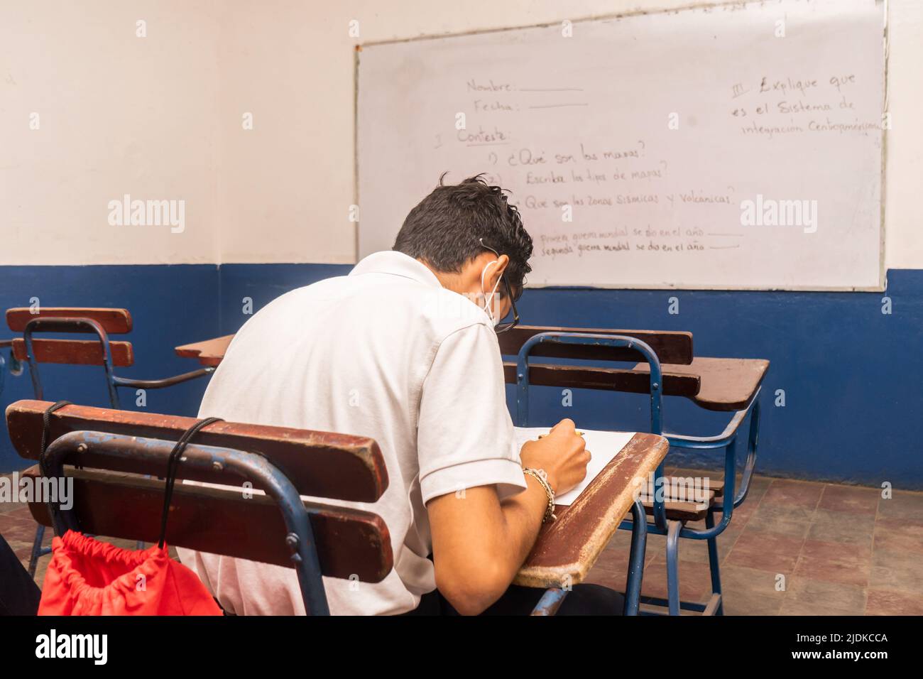 Young Nicaraguan single student taking an exam in a classroom Stock ...