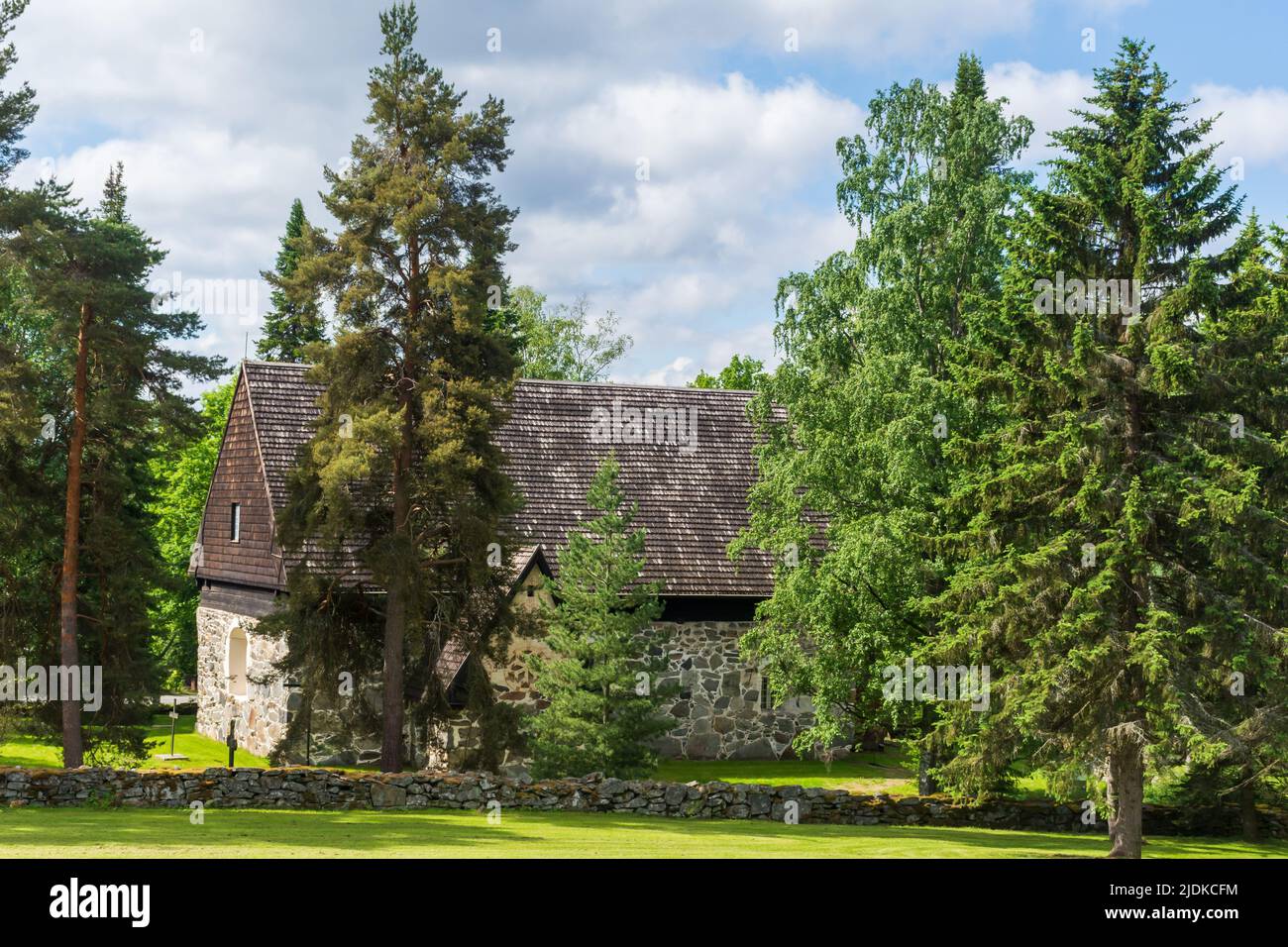 Old medieval stone church with tarred shingle roof in Messukylä Tampere ...