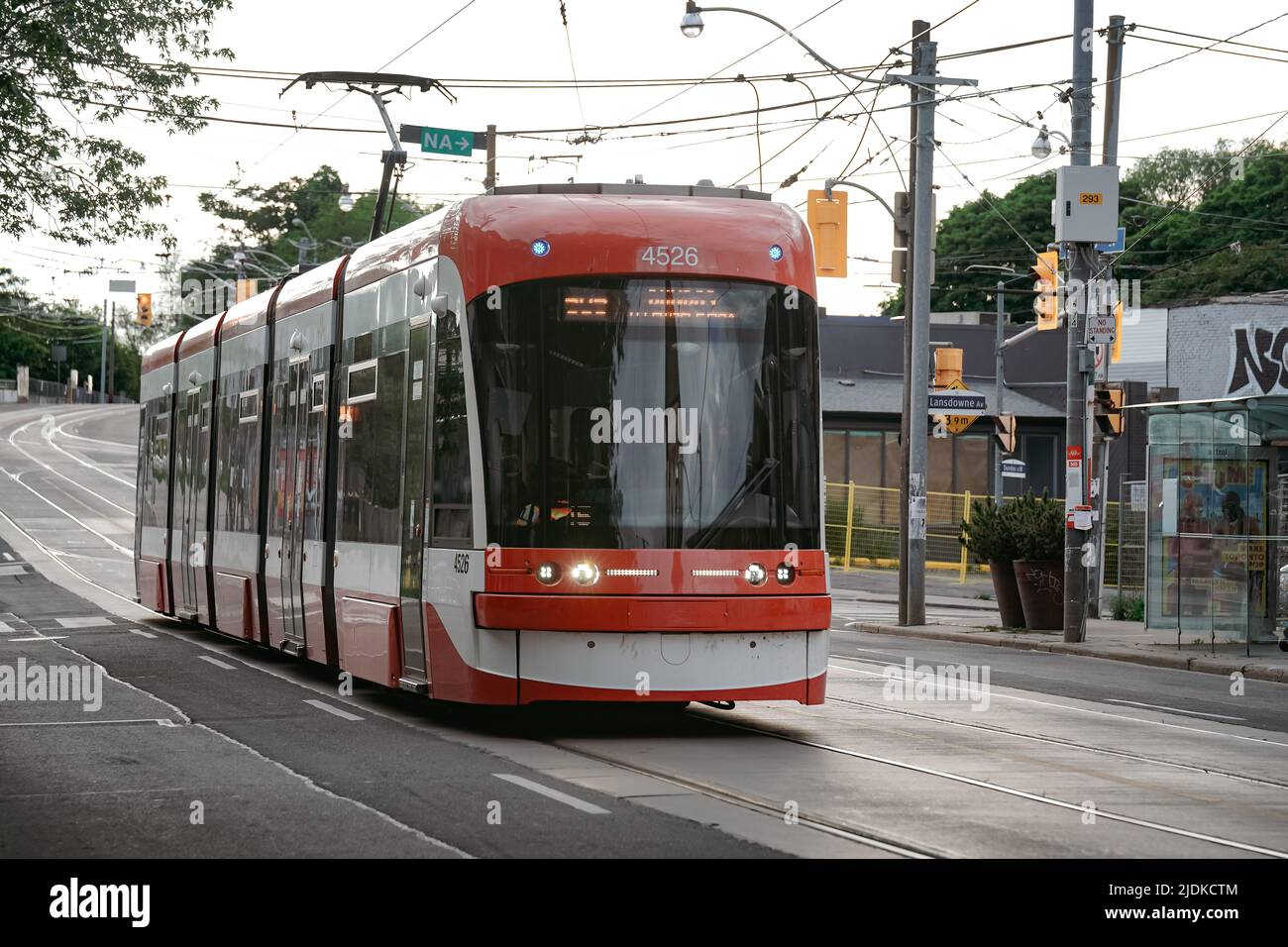 Toronto public streetcar tram outdoor red white Stock Photo - Alamy