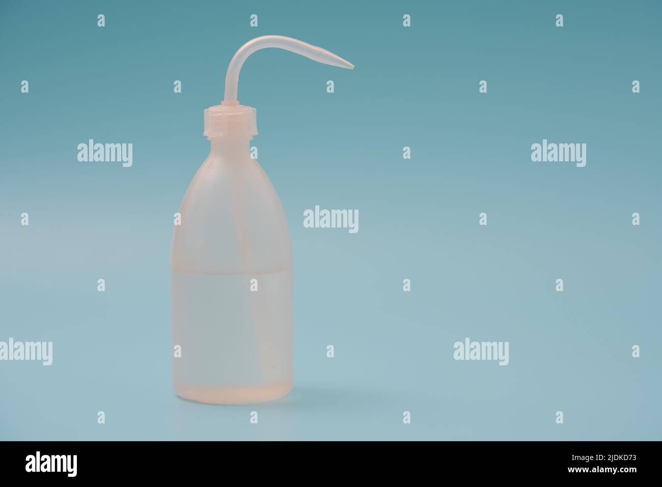 plastic laboratory dispenser with chemical liquid Stock Photo - Alamy