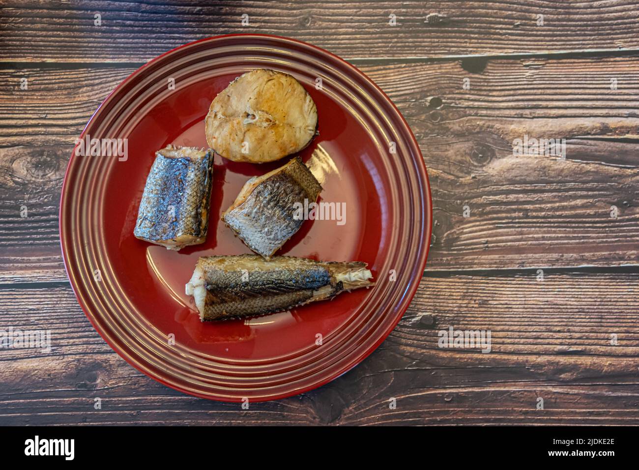 Nigerian grilled fish ready to eat Stock Photo - Alamy