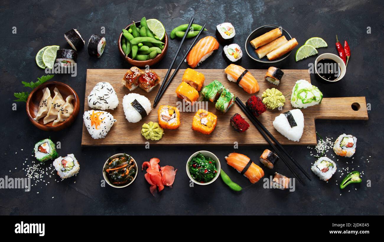 Japanese food assortment on dark background. Traditional food concept ...