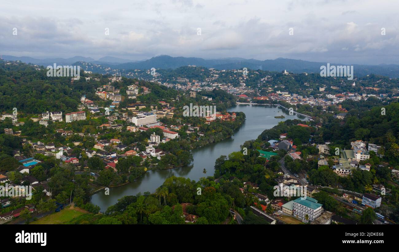 Downtown Kandy with a lake and buildings in the morning view from above ...