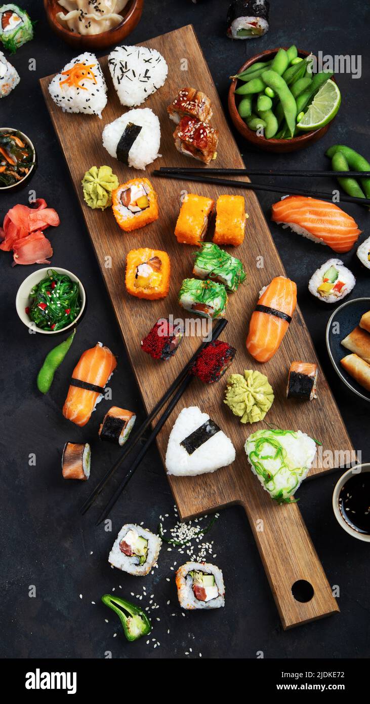Japanese food assortment on dark background. Traditional food concept ...