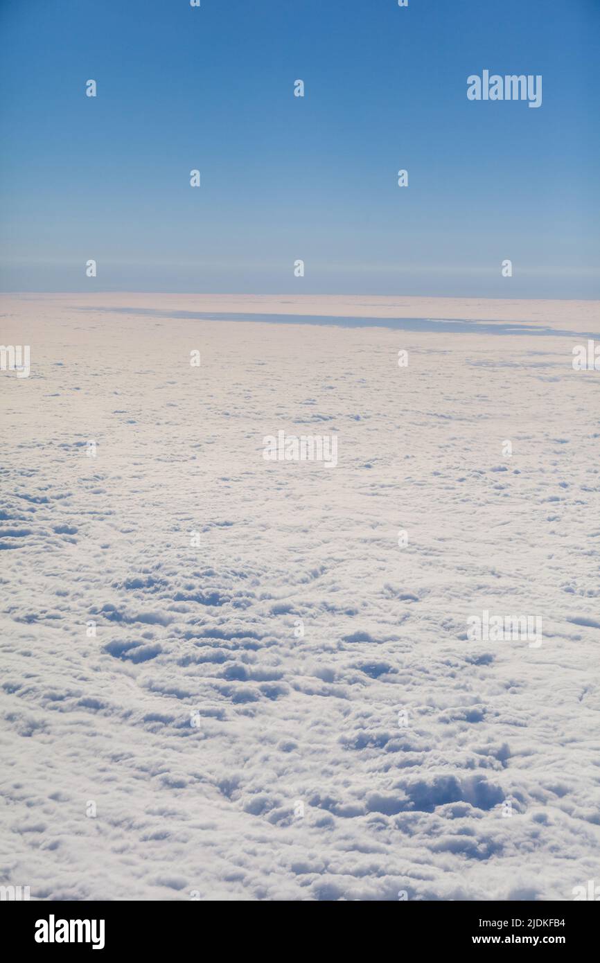 Airplane flight. Wing of an airplane flying above the clouds Stock ...