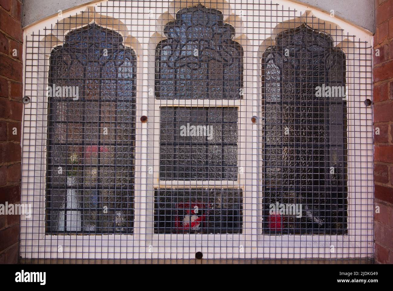 stained glass windows with security mesh Stock Photo - Alamy
