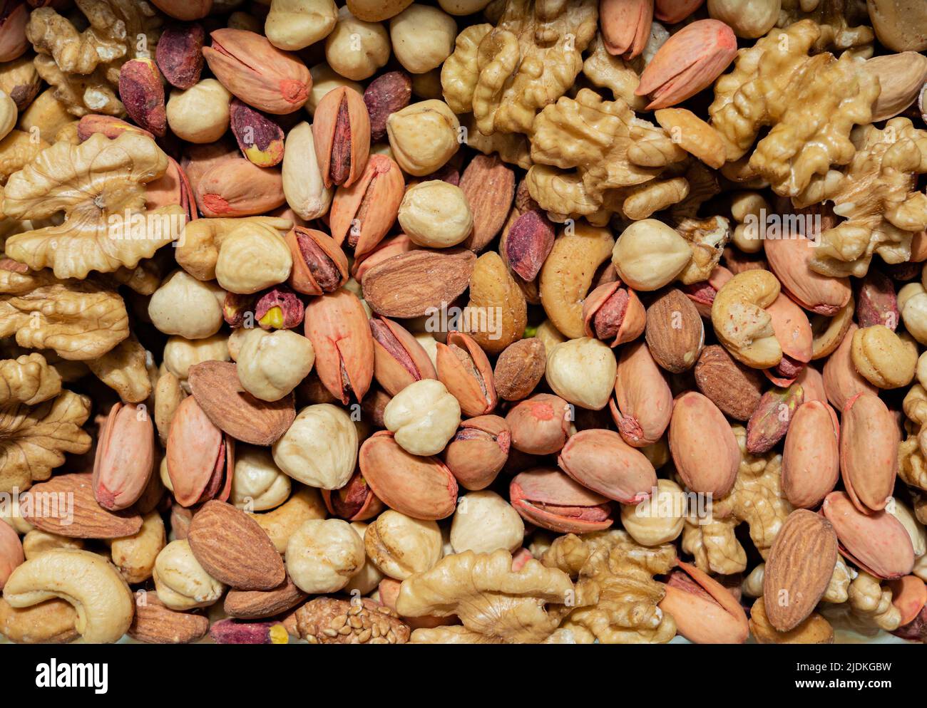 A mixture of peeled nuts for food as a background texture Stock Photo ...