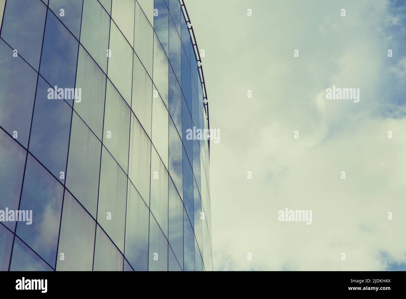 Blue glass of windows building background Stock Photo - Alamy
